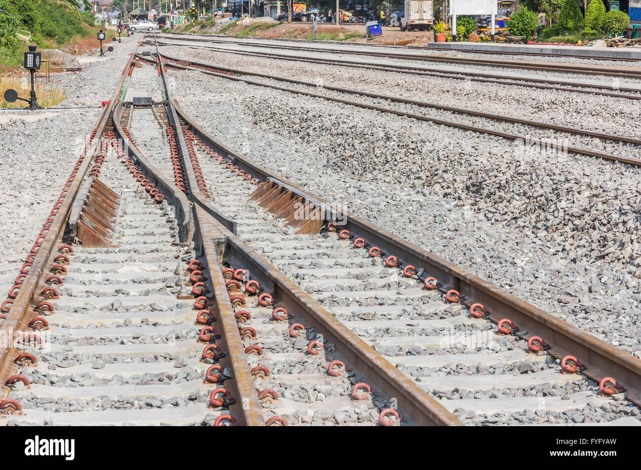 Railroad tracks crossing of a Public Thai Train Railway Stock Photo - Alamy