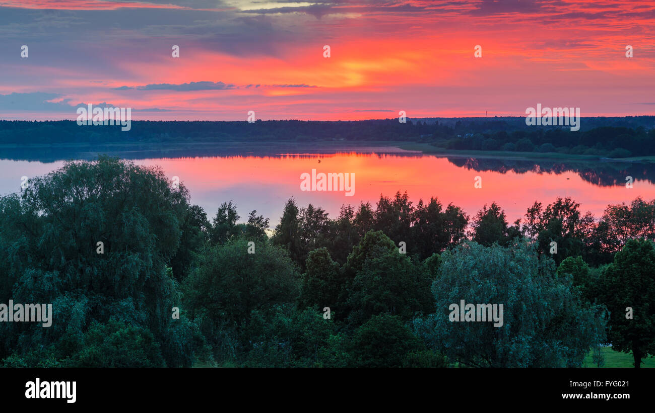 Beautiful sunset over the lake. Nature background Stock Photo - Alamy