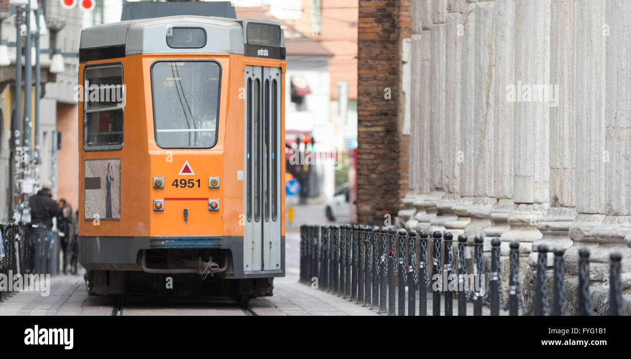 Orange tram car in MIlan, Italy Stock Photo - Alamy