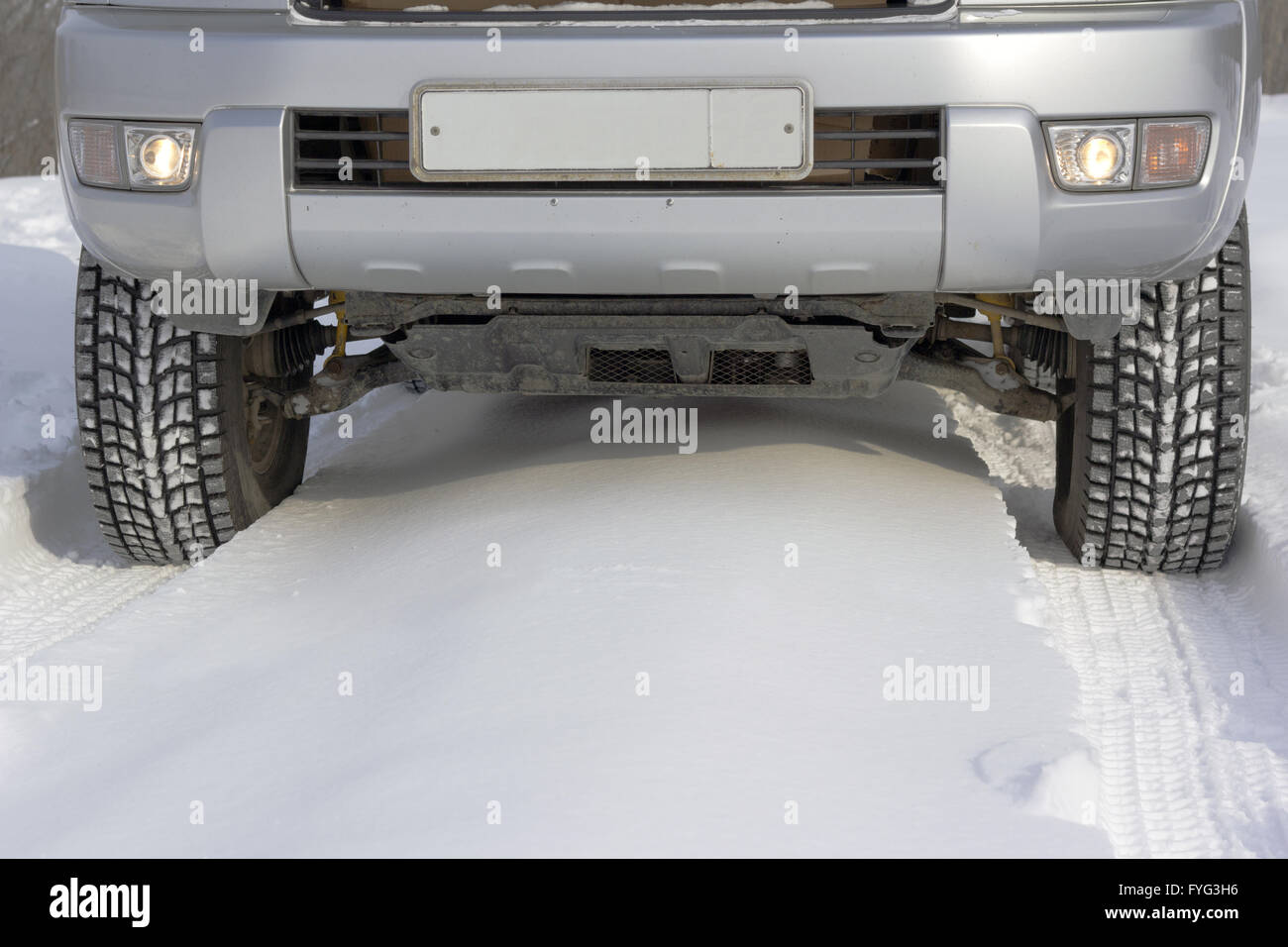 Snowy winter road ahead an unrecognizable car Stock Photo - Alamy