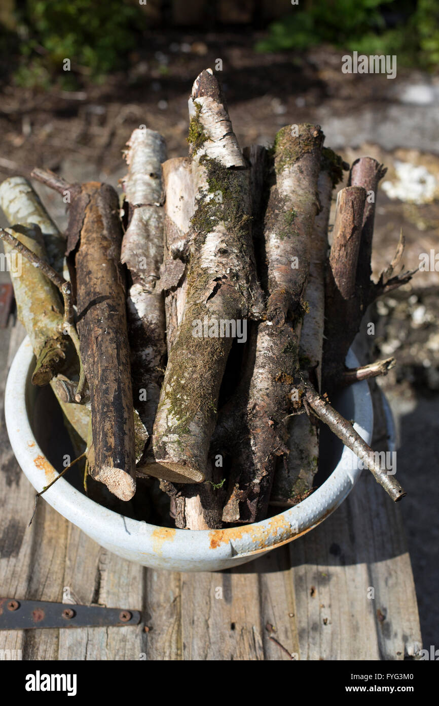 Chopped wooden logs for burning Stock Photo - Alamy