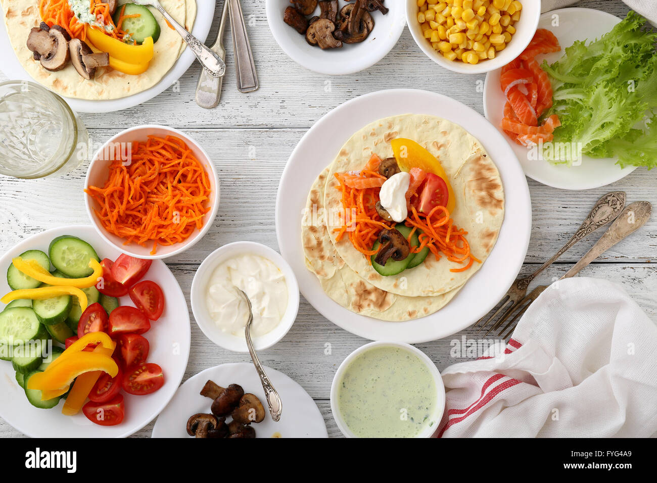 mexican tacos on white table, food background Stock Photo - Alamy