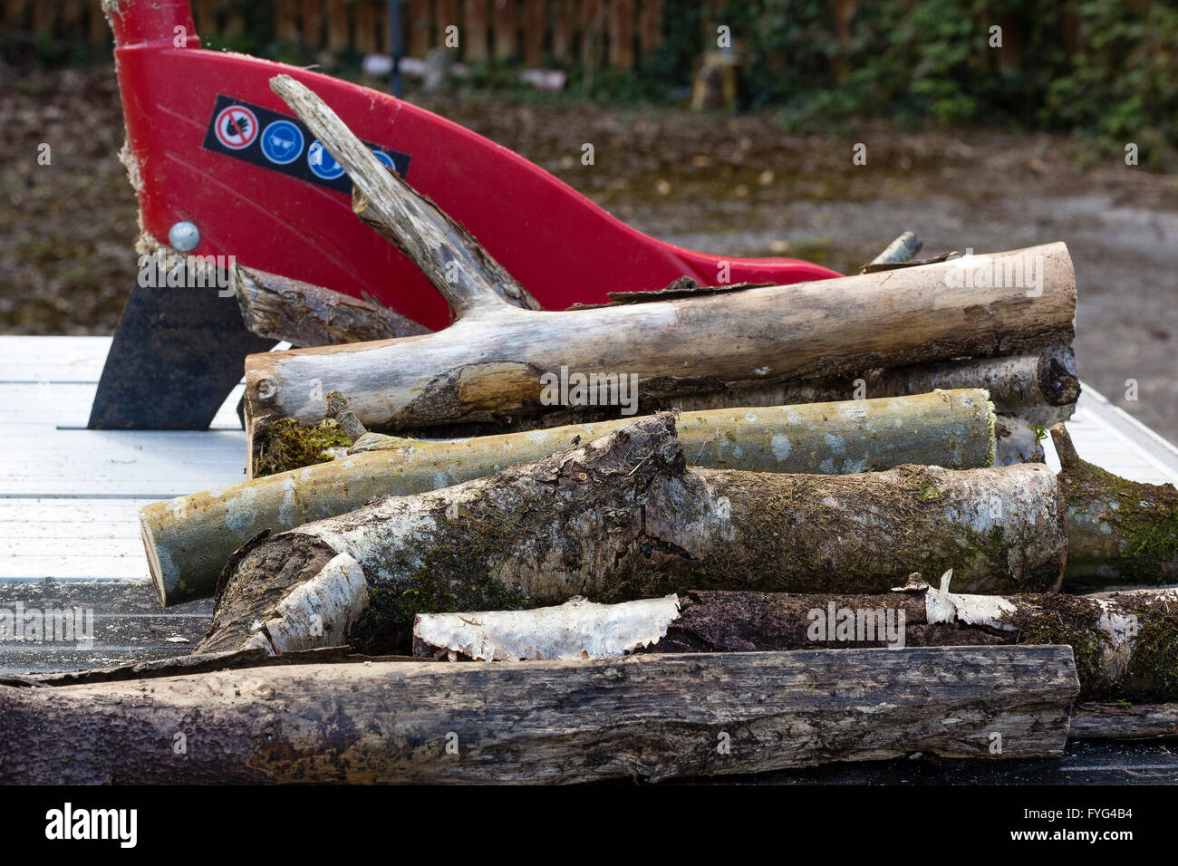 Chopped wooden logs for burning Stock Photo - Alamy