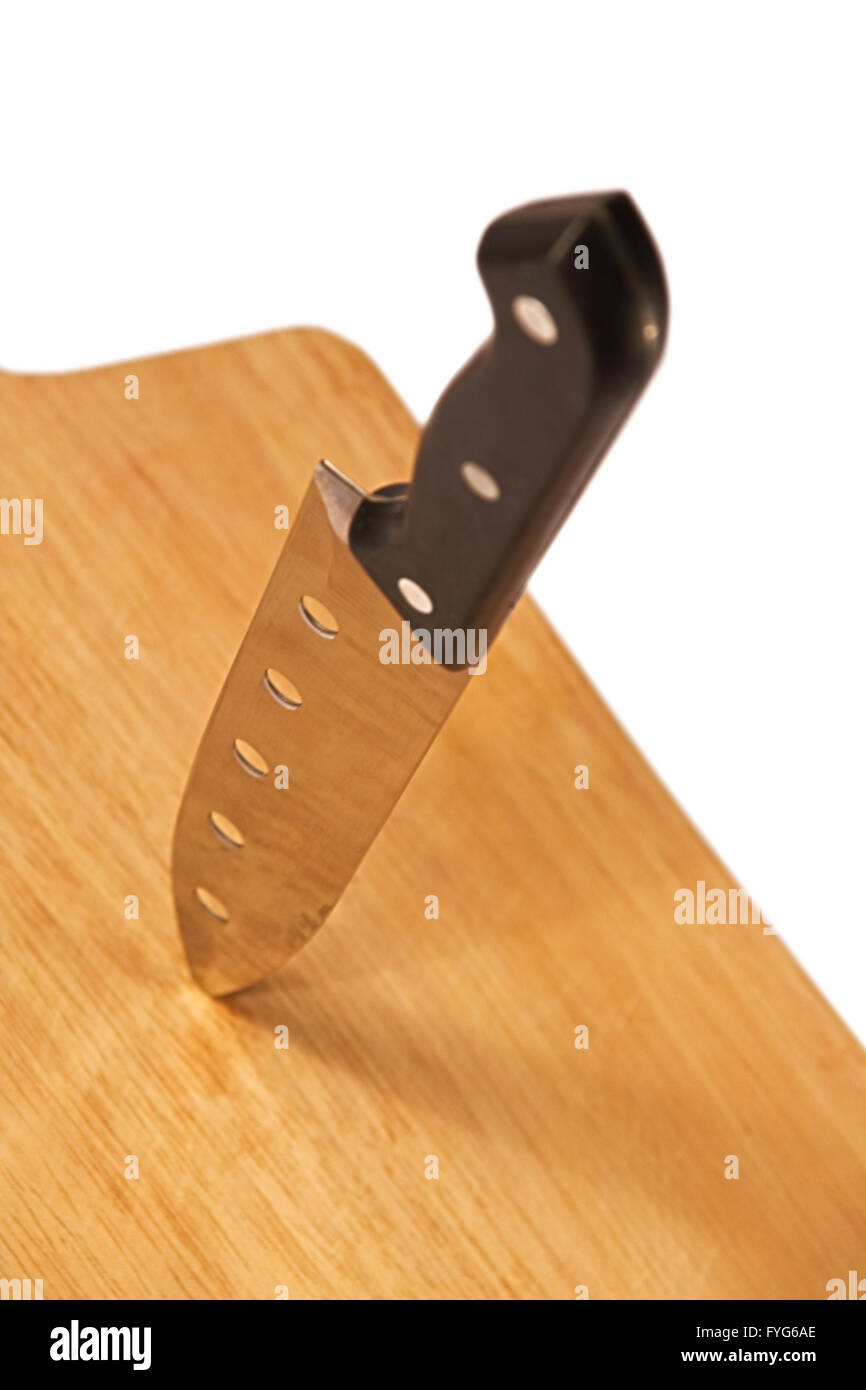 steel knife with handle stick into a table Stock Photo - Alamy