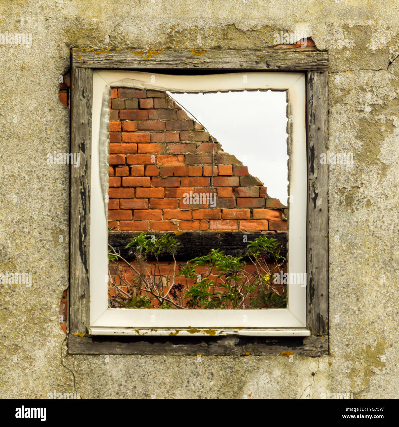 A window frame on a derelict building Stock Photo - Alamy