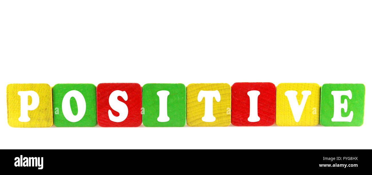 positive - isolated text in wooden building blocks Stock Photo - Alamy