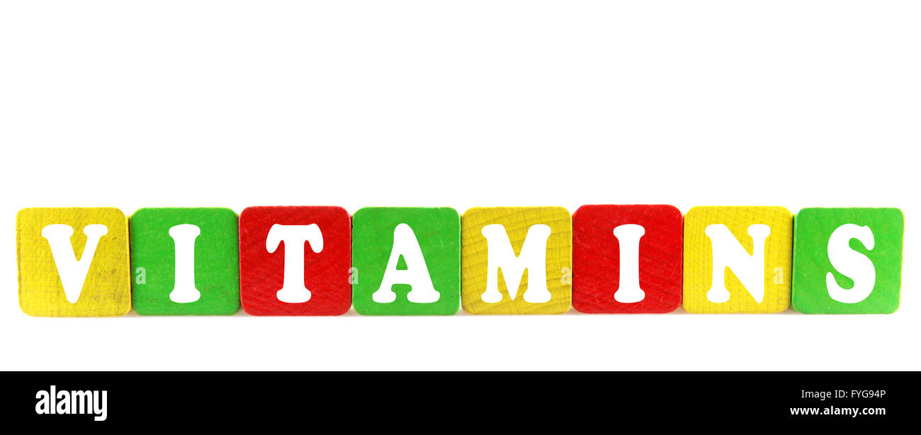 vitamins - isolated text in wooden building blocks Stock Photo - Alamy