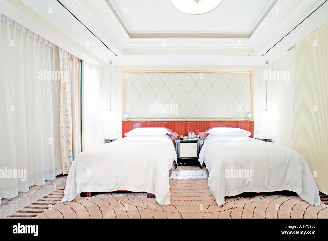 bed in live room Stock Photo - Alamy