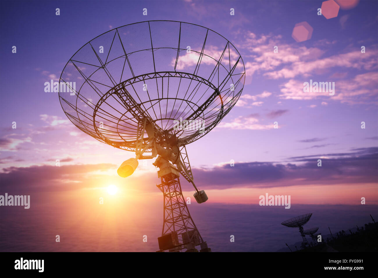 satellite dishes with sunset Stock Photo - Alamy