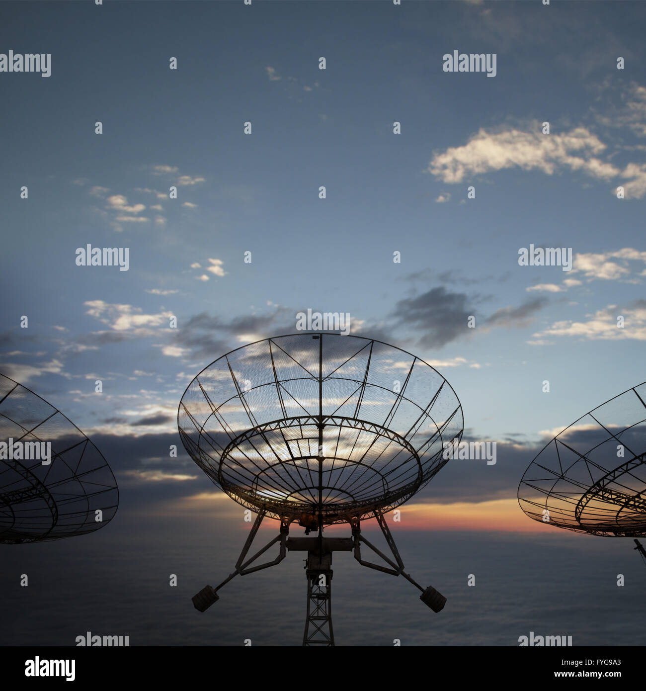 satellite dishes with sunset Stock Photo - Alamy