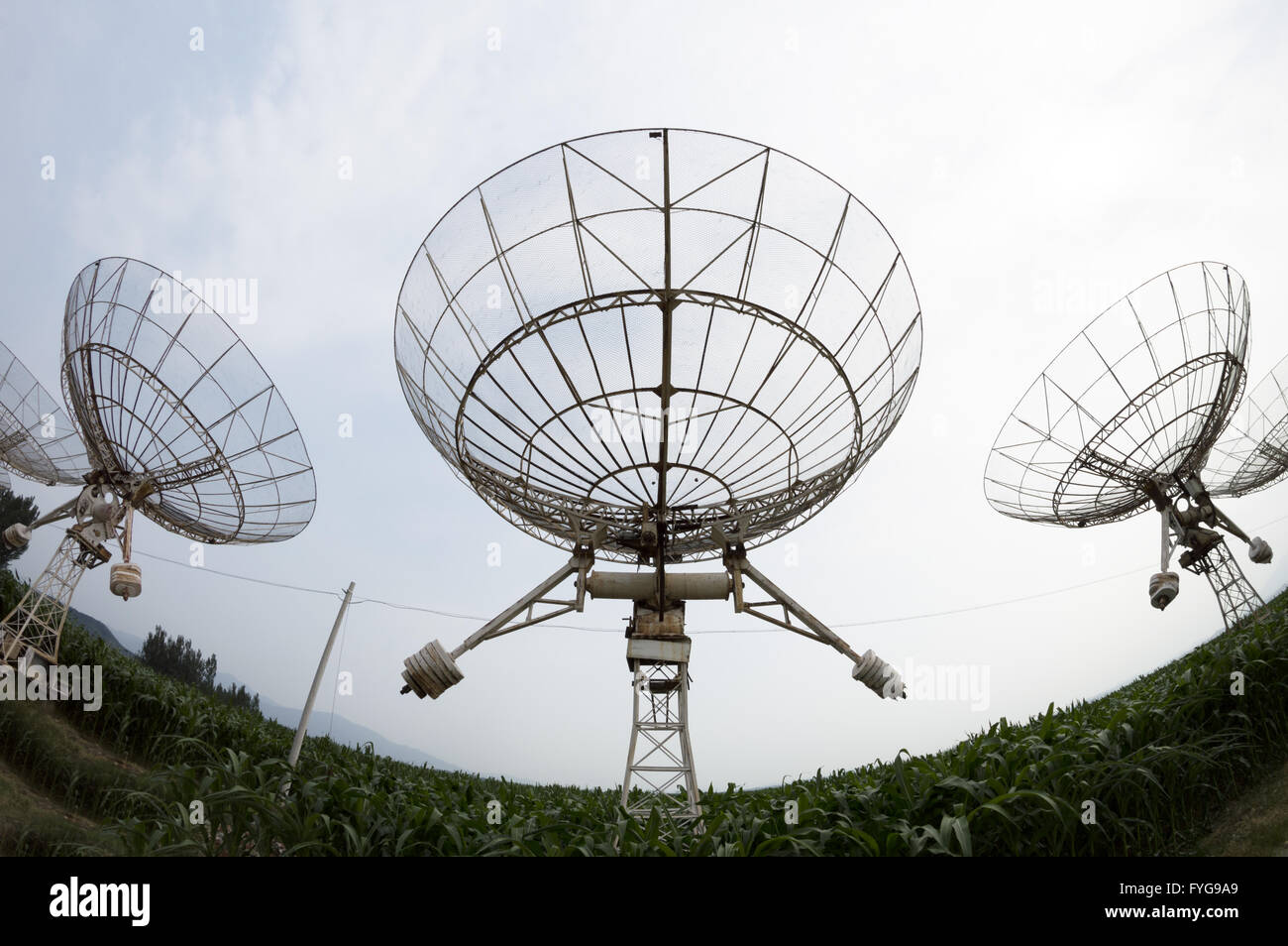 satellite dishes with sunset Stock Photo - Alamy