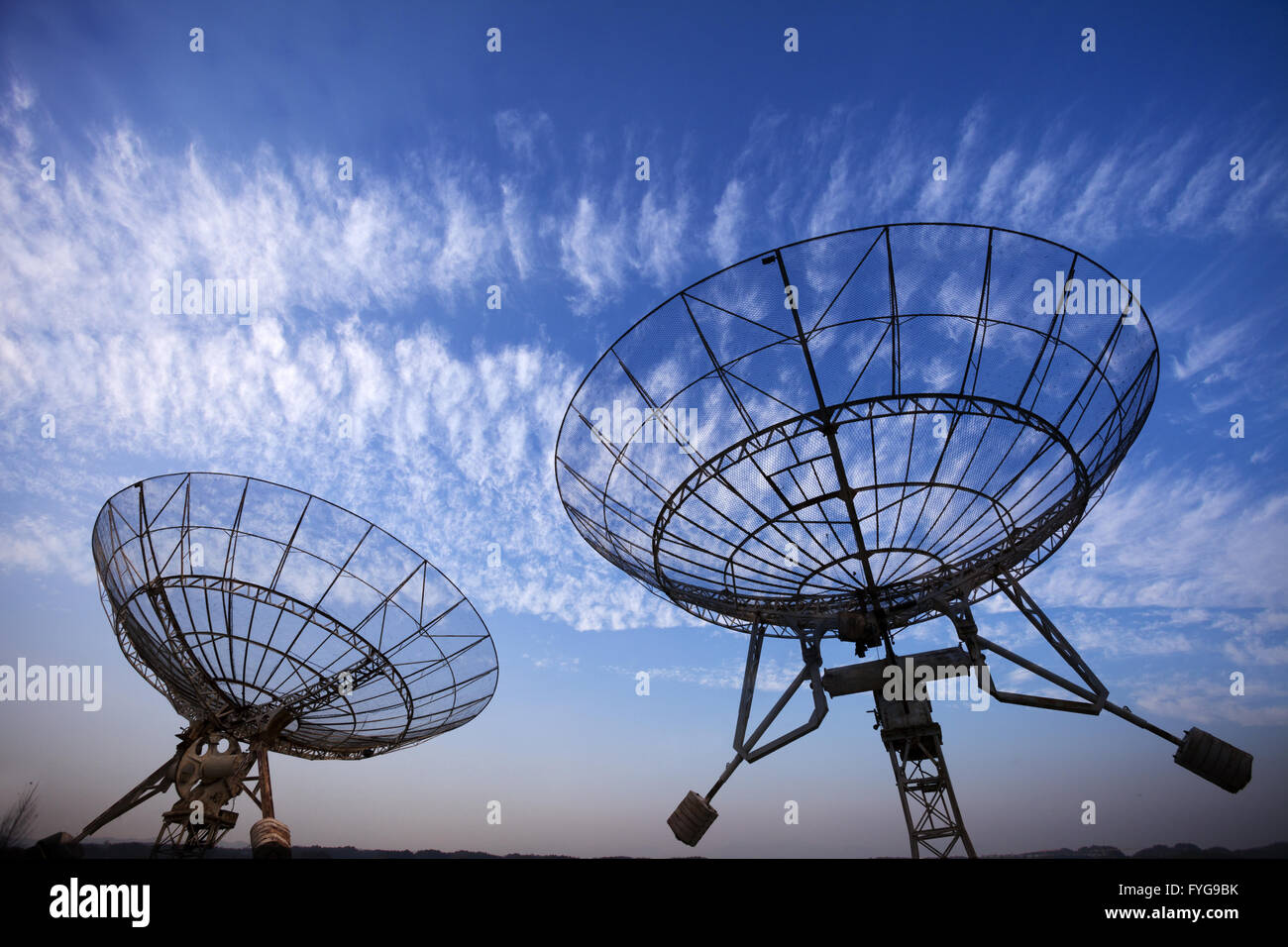 satellite dishes with blue sky Stock Photo - Alamy