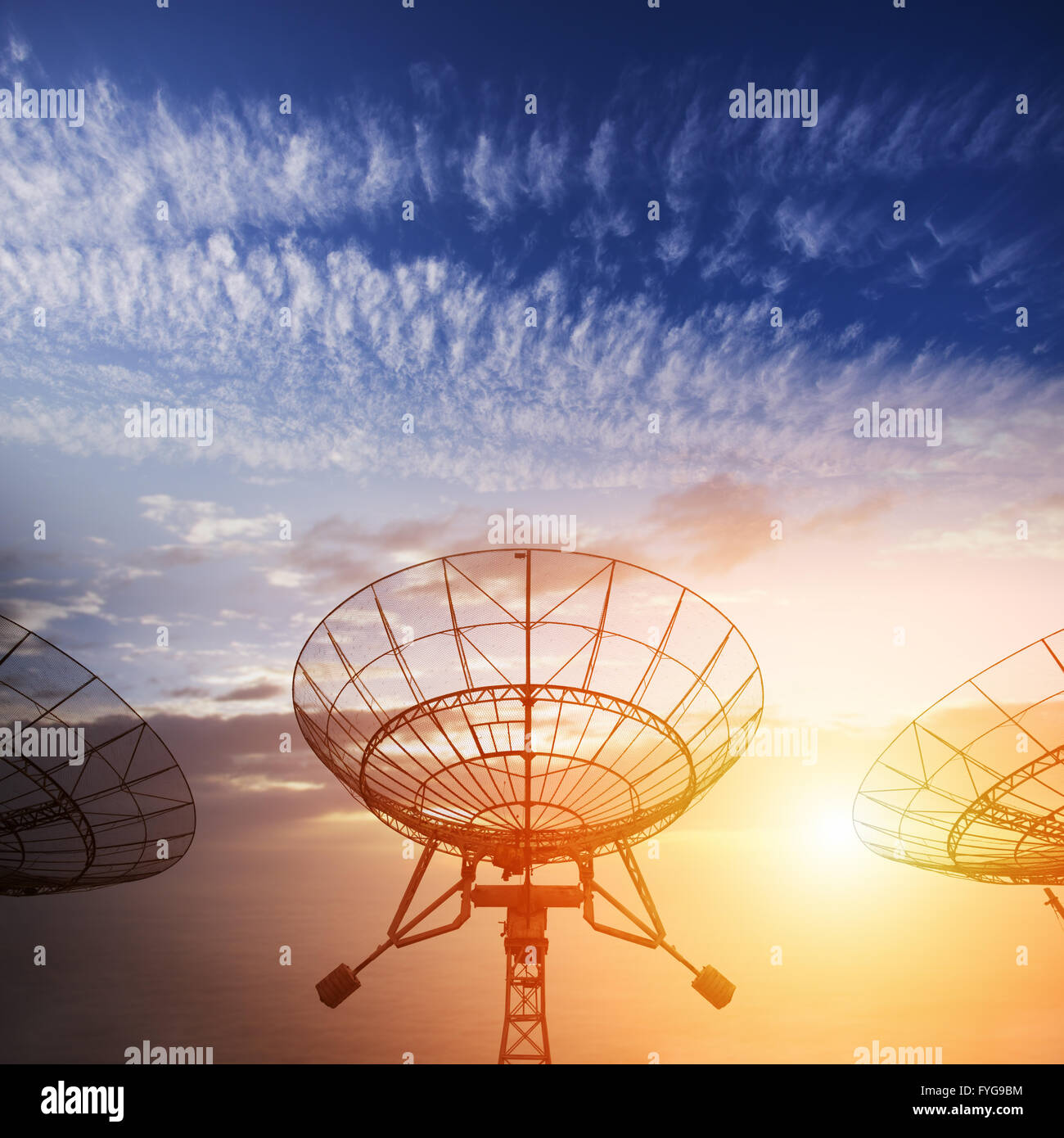 satellite dishes with sunset Stock Photo - Alamy
