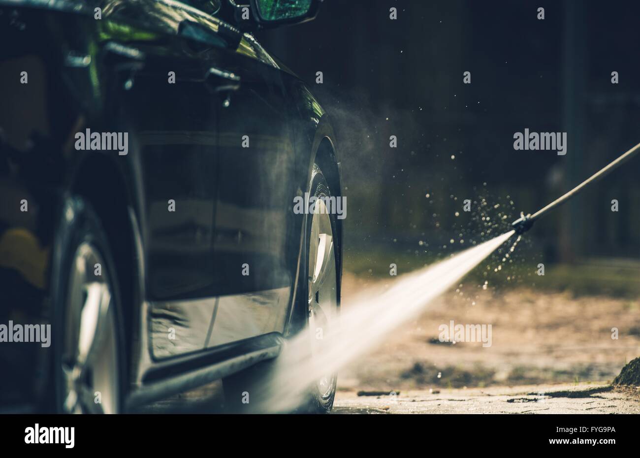 Detailed Car Washing Using Pressured Water Spraying Stock Photo - Alamy