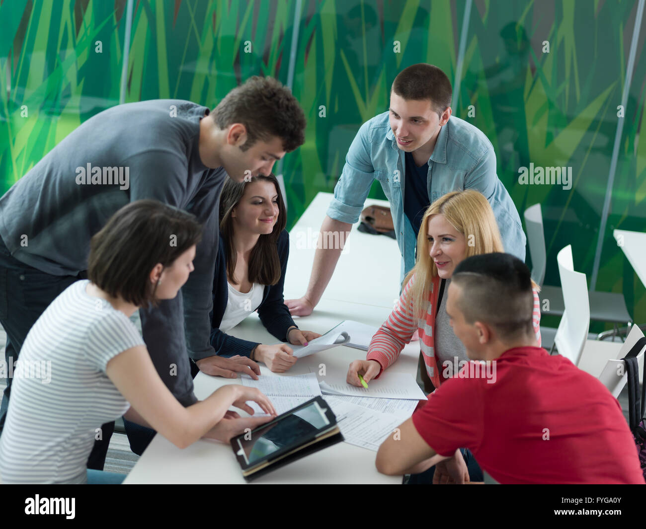 students group study together in school classroom and working together ...