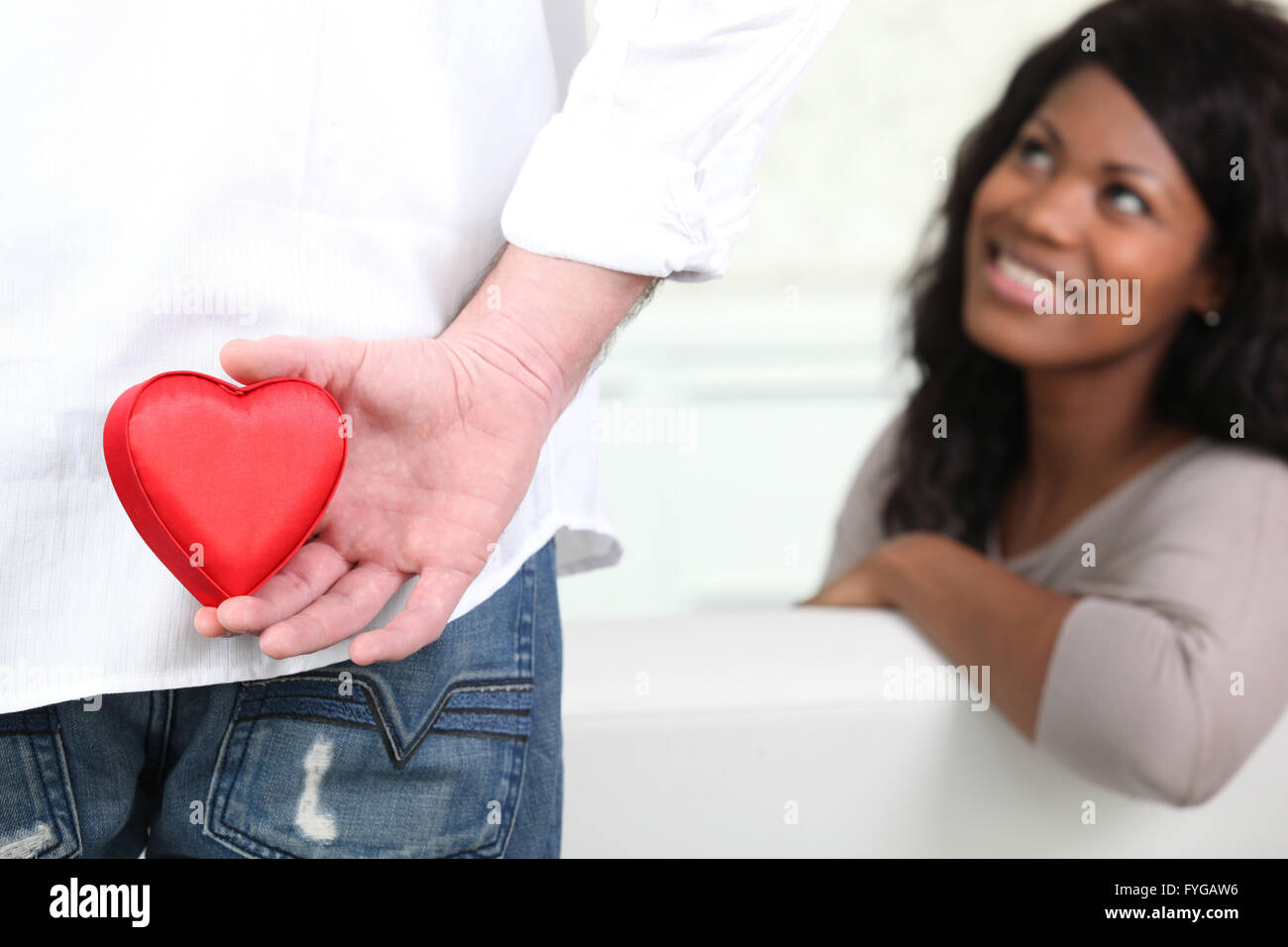 Man about to give his heart to his girlfriend Stock Photo - Alamy