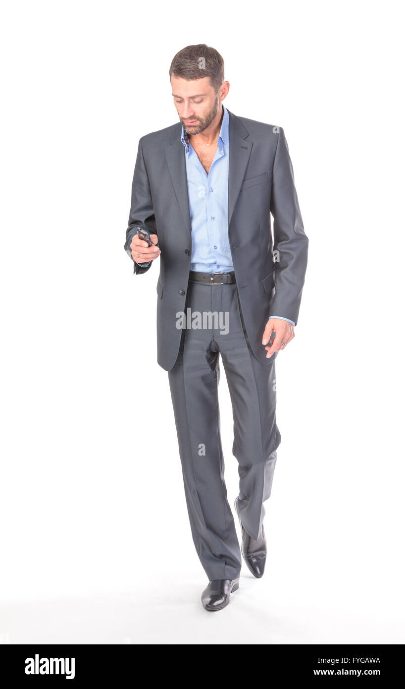 Full length portrait businessman with mobile phone Stock Photo - Alamy