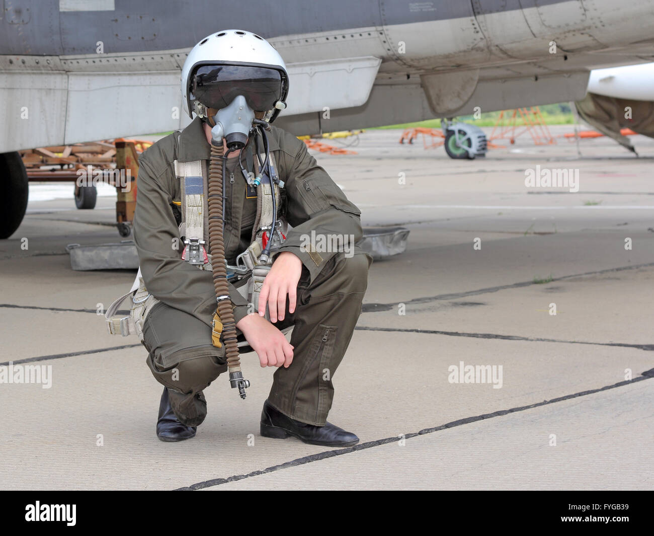 military pilot in a helmet near the aircraft Stock Photo - Alamy