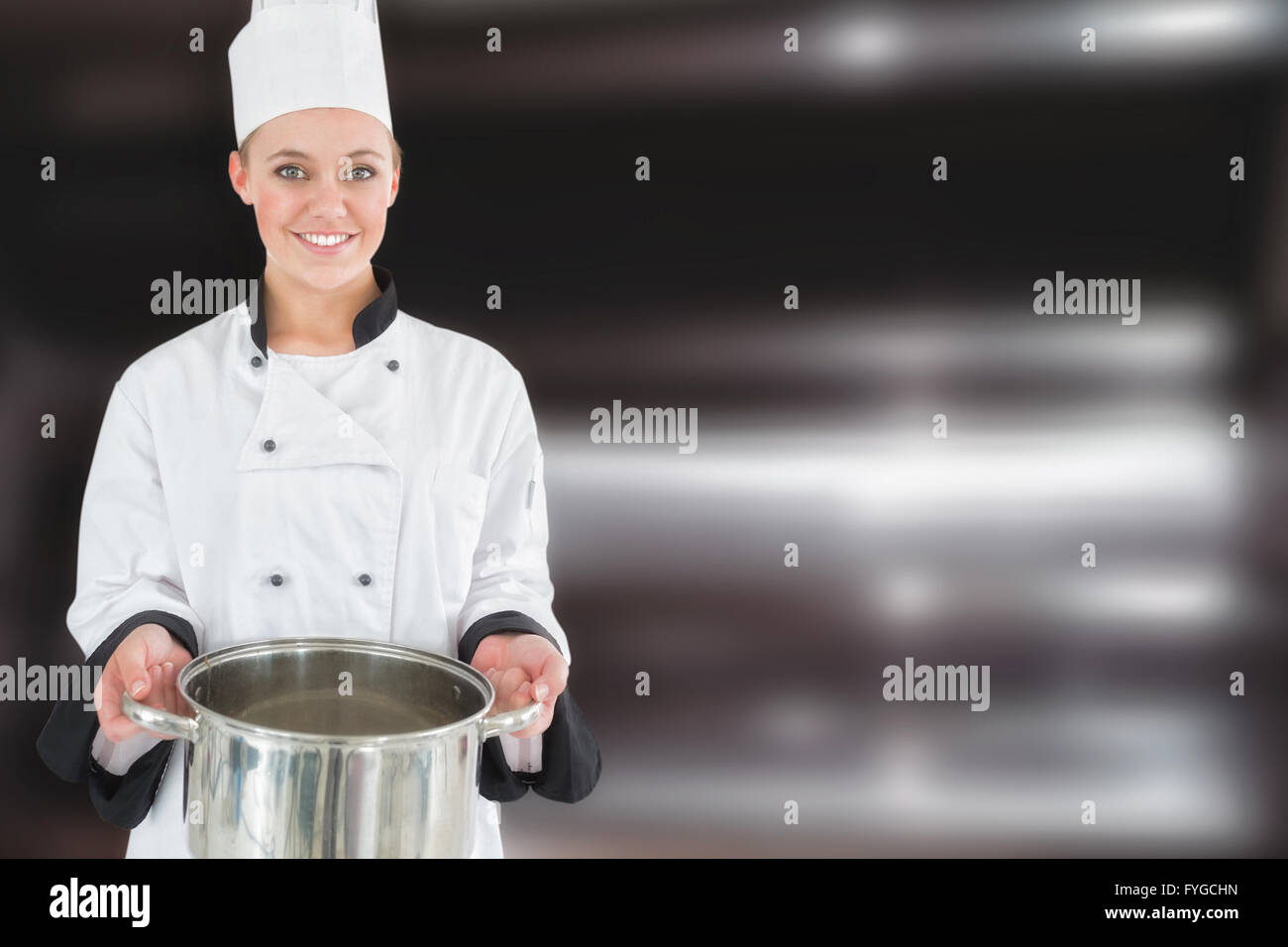 Happy female chef saucepan hi-res stock photography and images - Alamy