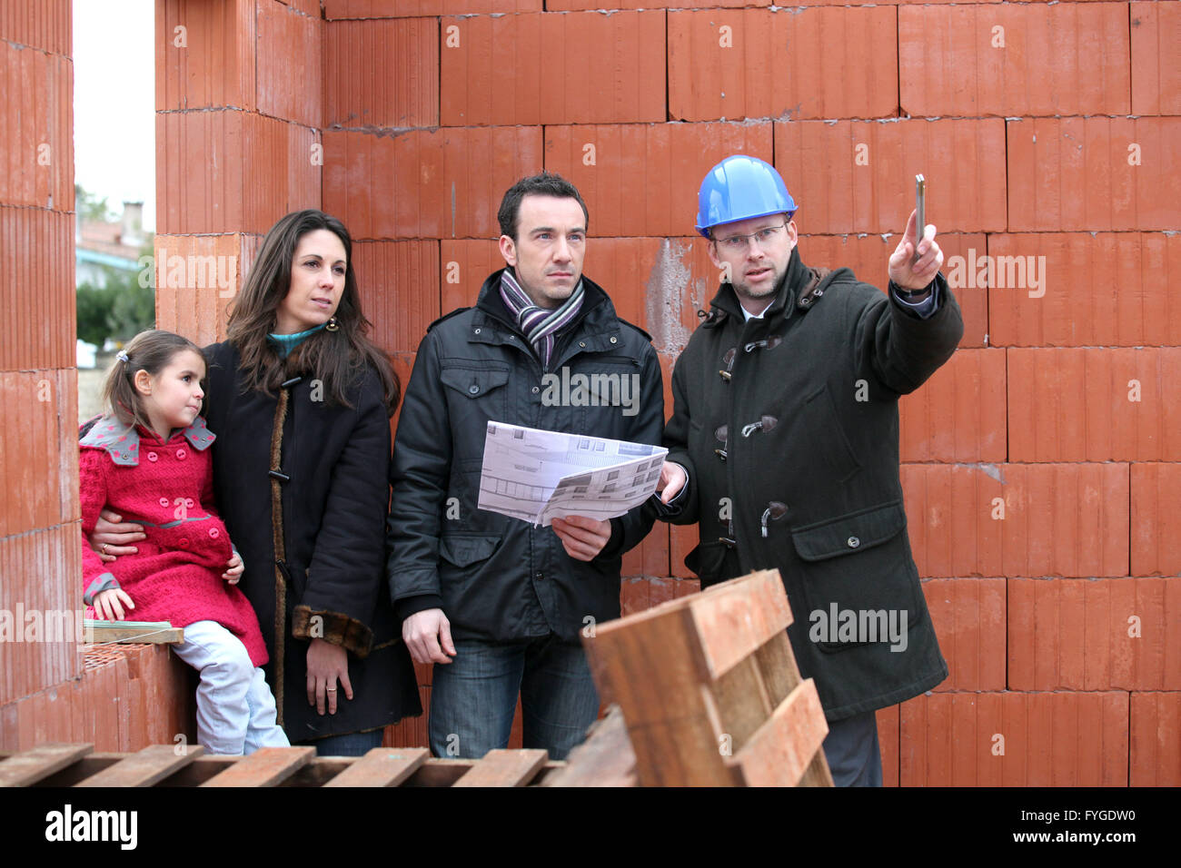 Couple having their new home inspected by an engineer Stock Photo - Alamy