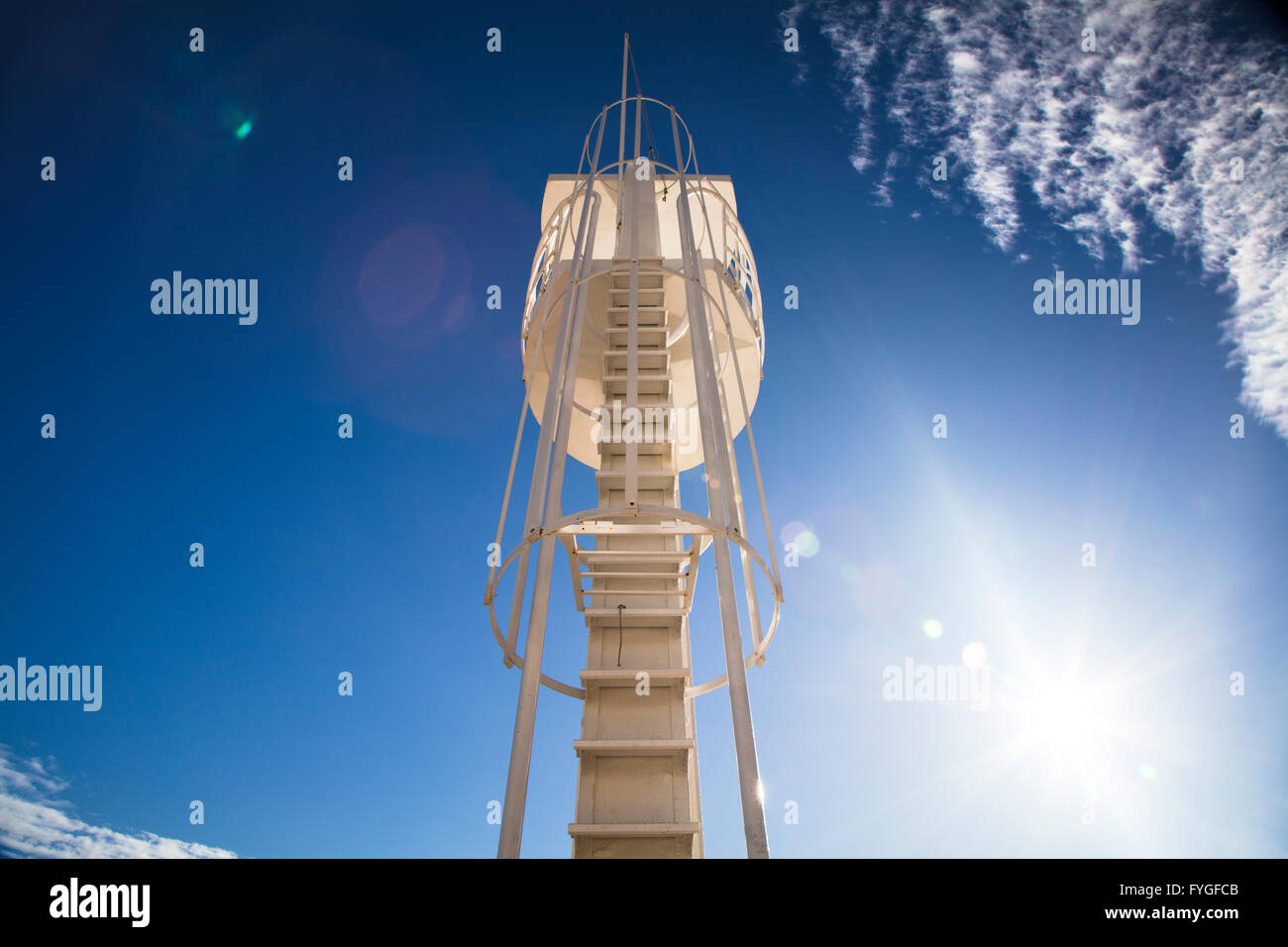 Watchtower with blue sky backgrounds and sun shining Stock Photo - Alamy