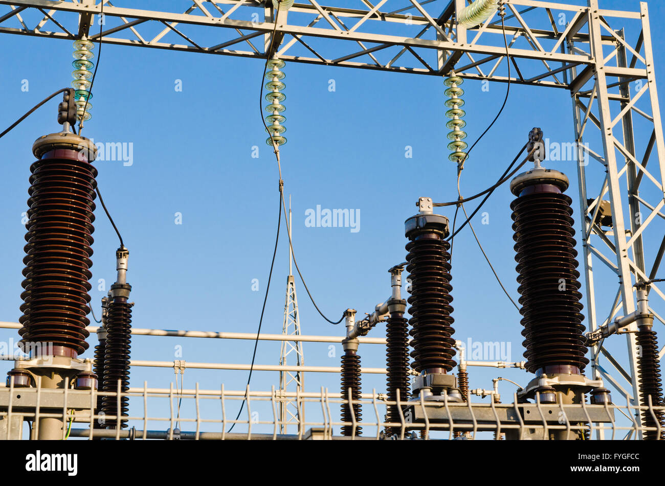 High-voltage insulators on transformer substation Stock Photo - Alamy