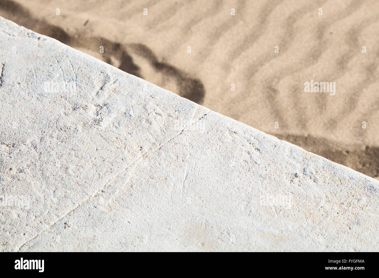 Detail of paving stone with sand at the beach in Calpe, Spain Stock ...