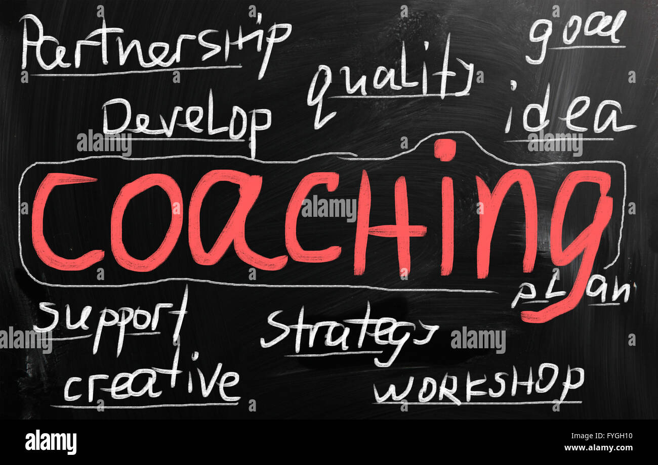 Coaching handwritten with white chalk on a blackboard Stock Photo - Alamy