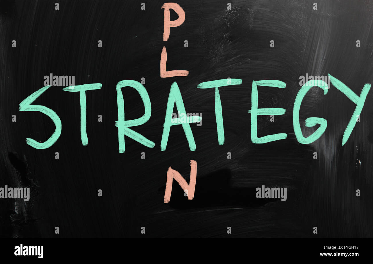 Strategy handwritten with white chalk on a blackboard Stock Photo - Alamy