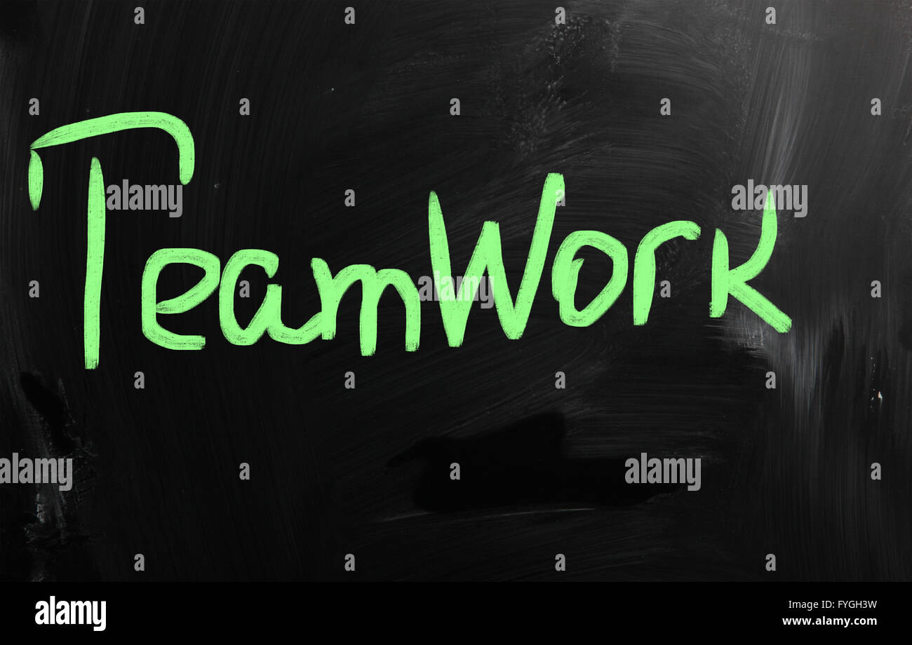 Teamwork handwritten with white chalk on a blackboard Stock Photo - Alamy