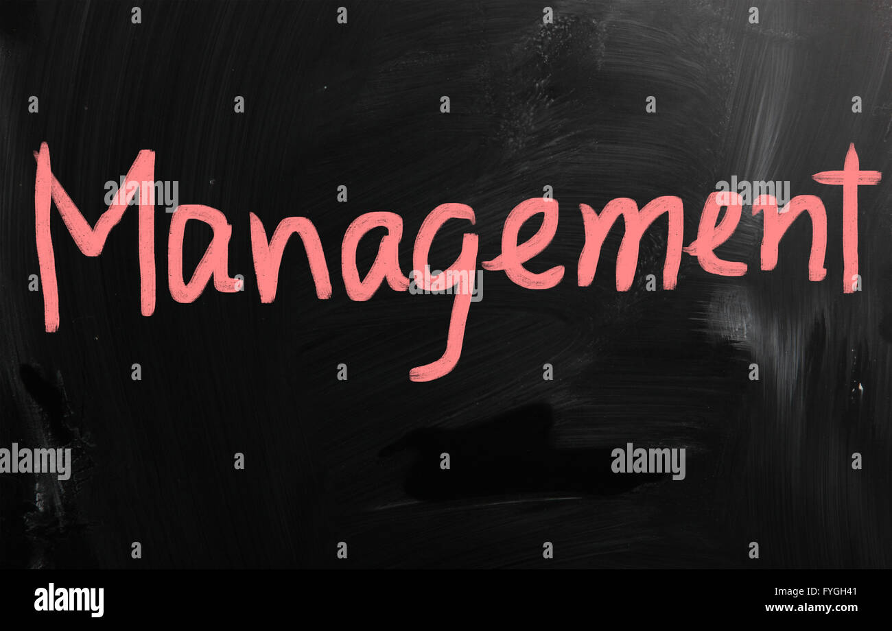 Management handwritten with white chalk on a blackboard Stock Photo - Alamy