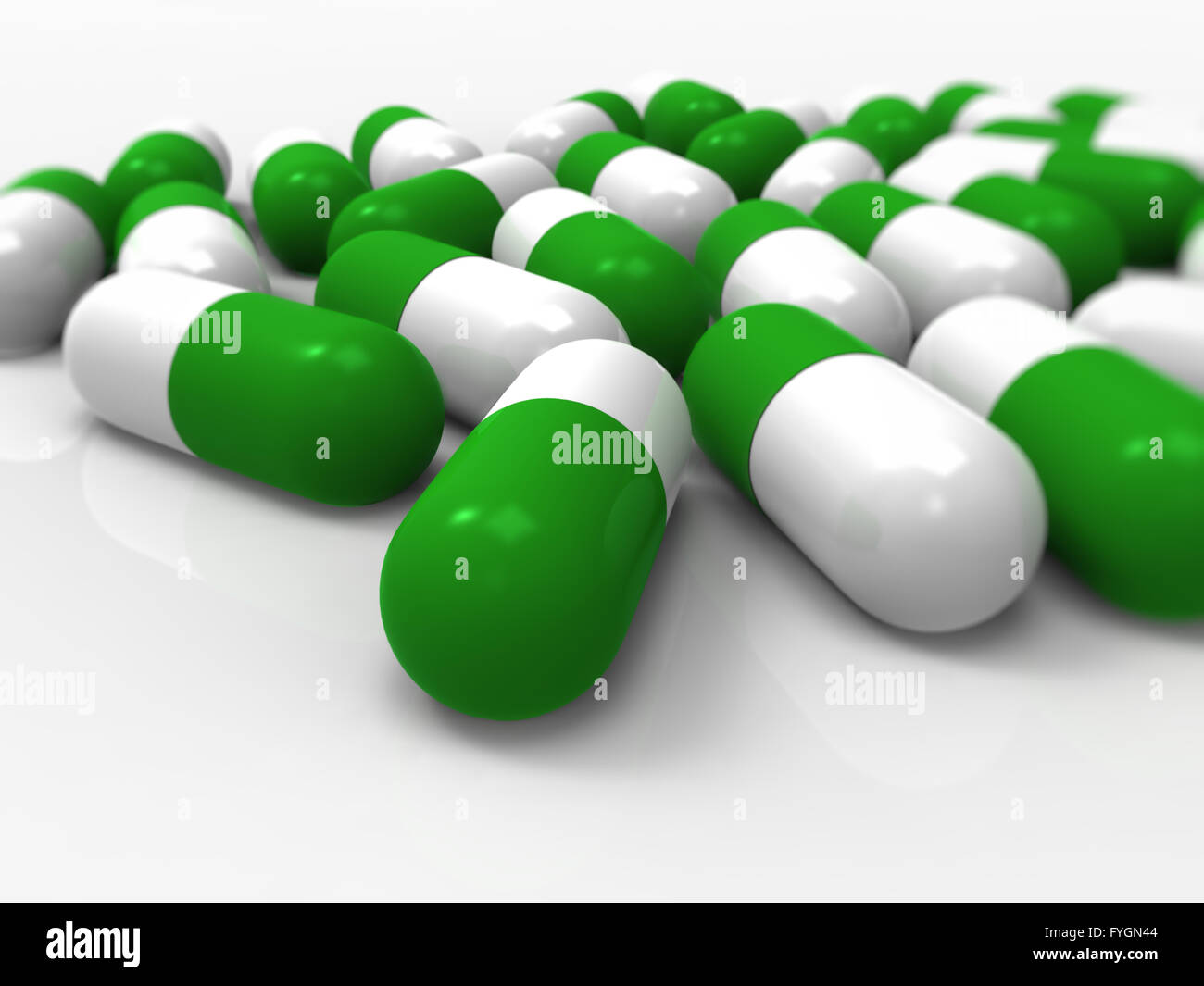 Green capsules, pharmaceutical, medical Stock Photo - Alamy