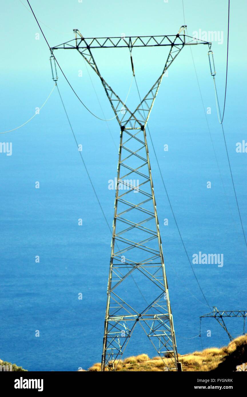 A high-voltage electric pole on the background of ocean Stock Photo - Alamy