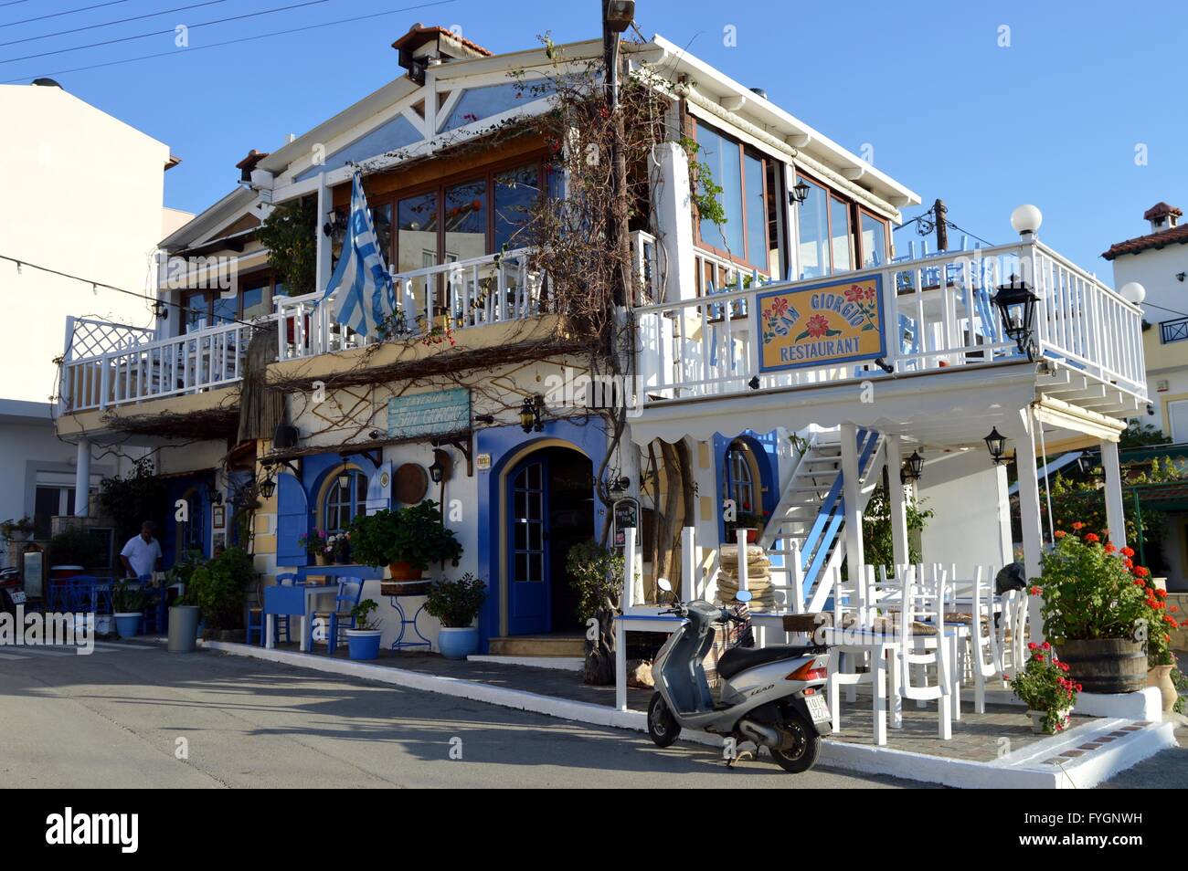 A Greek restaurant with colors blue and white and a terrace Stock Photo ...