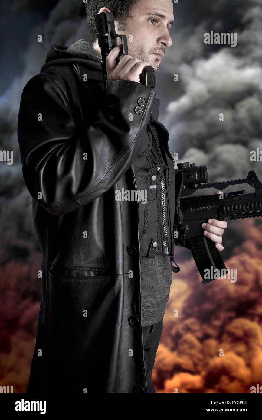 Armed man on background with explosion of fire and smoke, police Stock ...