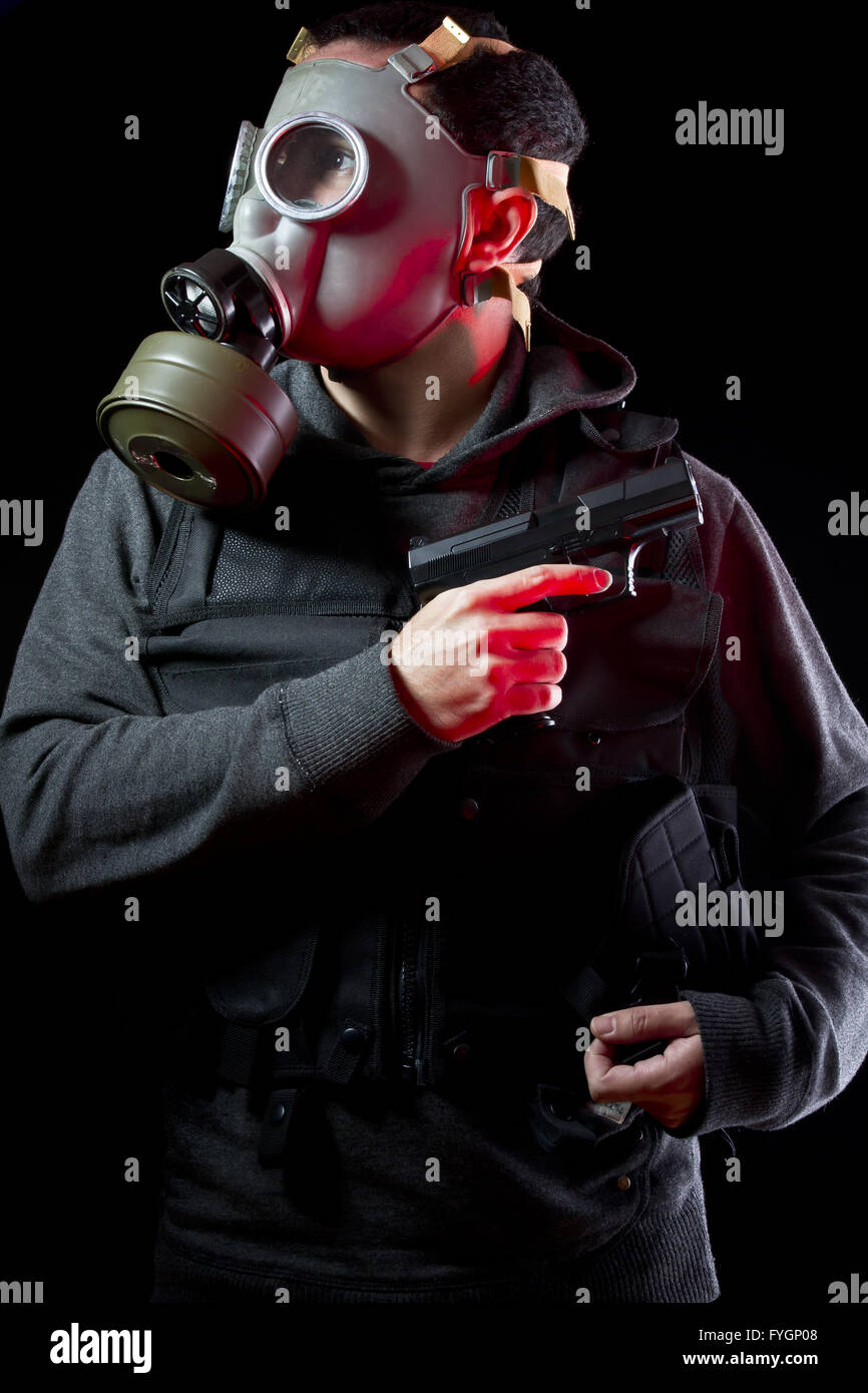 Man with gas mask and gun Stock Photo - Alamy