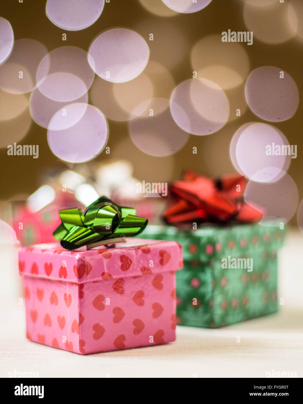 small gifts with bokeh background Stock Photo - Alamy