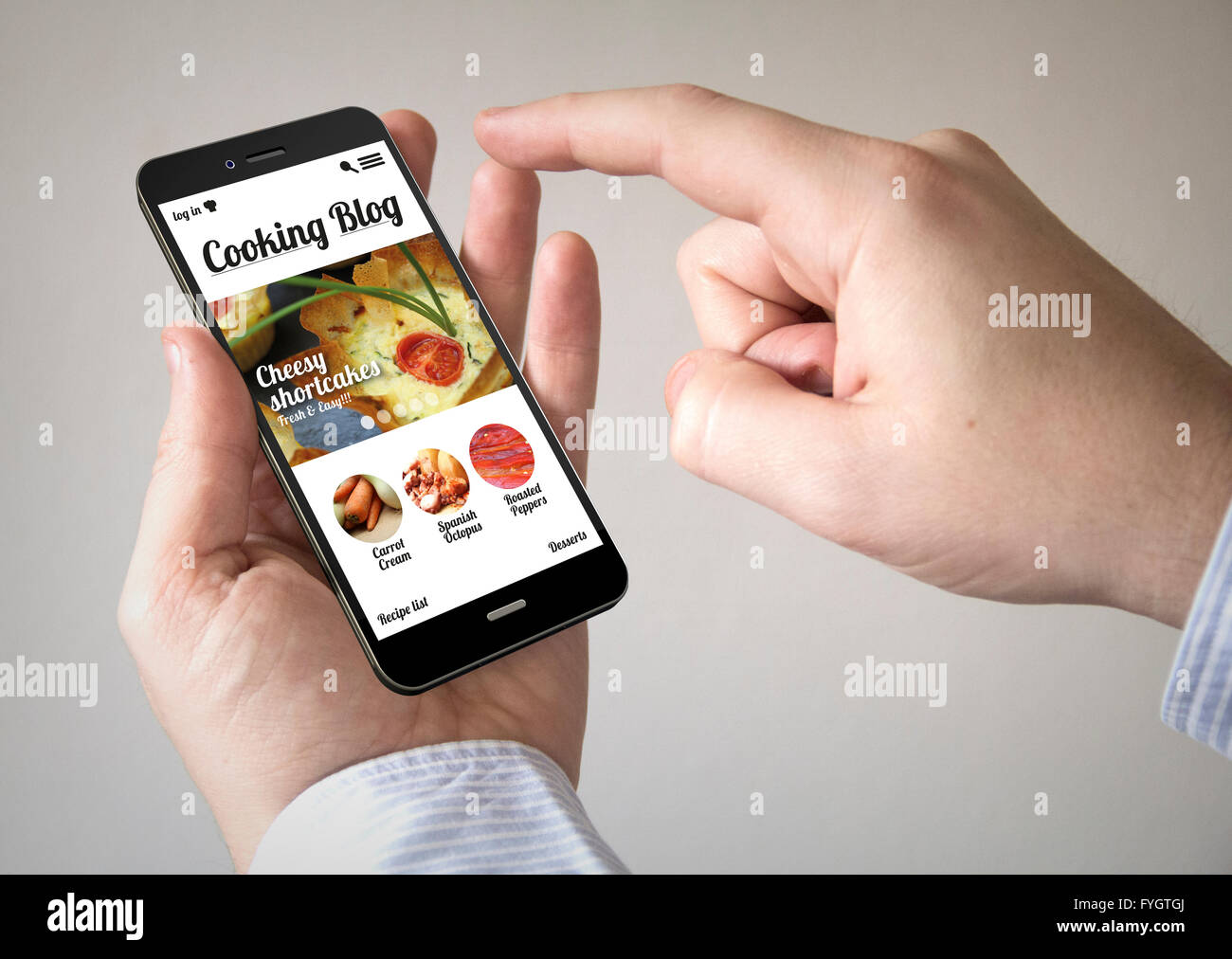 Close up of man using mobile smart phone with cooking application on ...