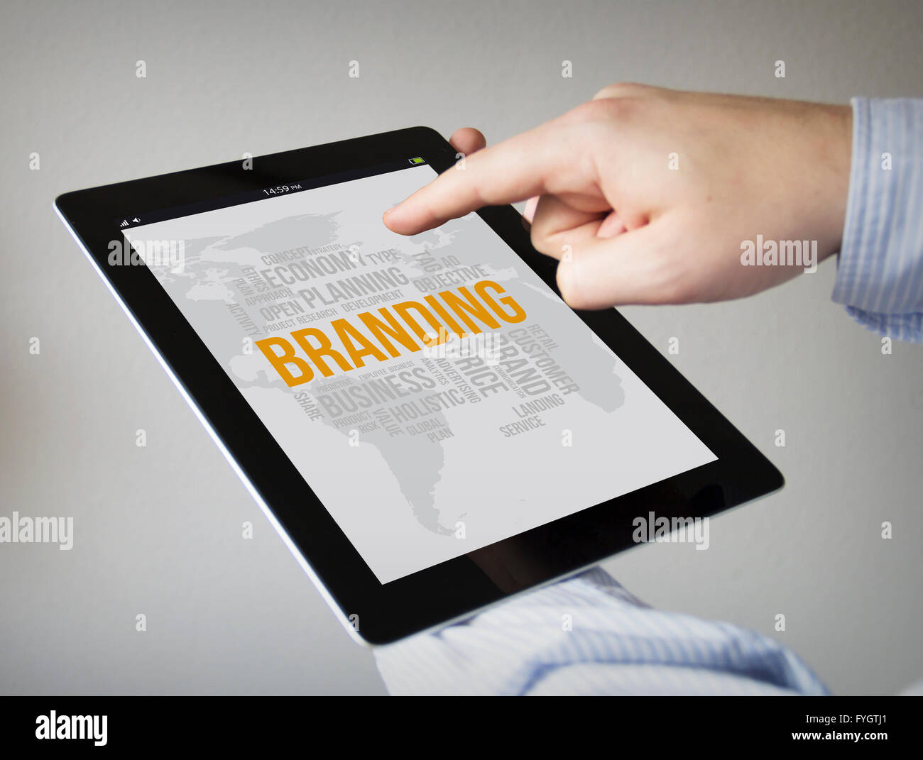 new technologies concept: hands with touchscreen tablet with branding ...