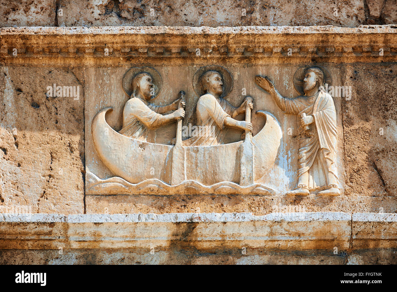 Sculpture of Christ on the 12th century Romanesque facade of the Chiesa ...