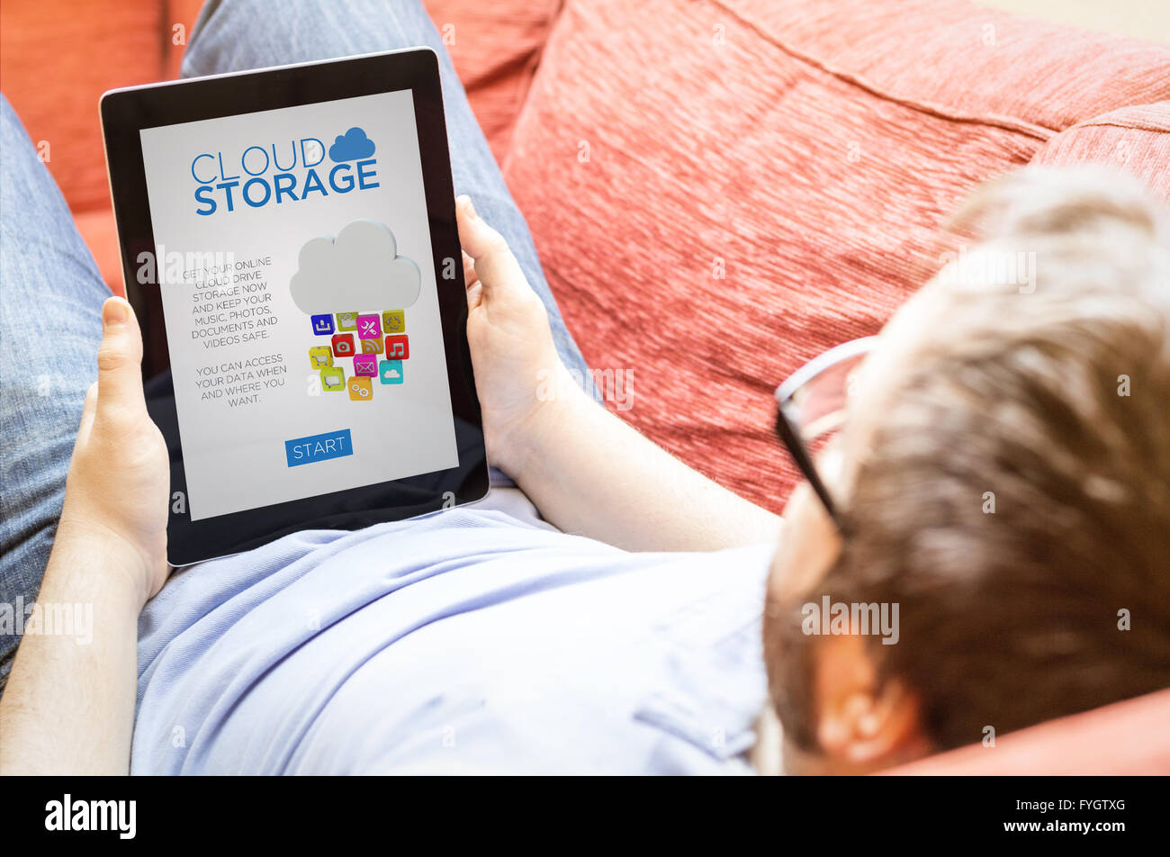technology lifestyle concept: hipster on the sofa with cloud storage ...