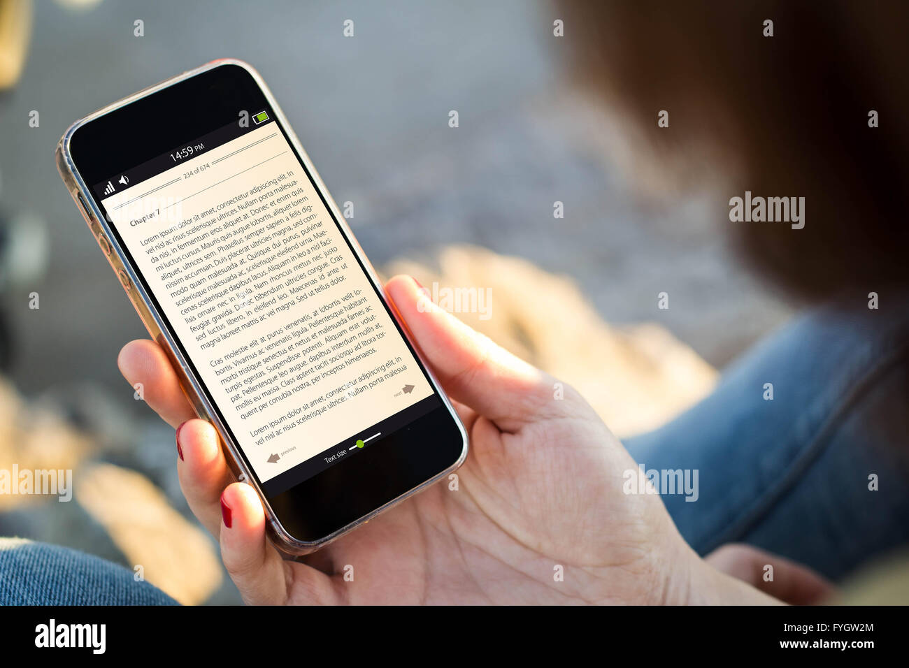 close-up view of young woman reading ebook on screen. All screen ...