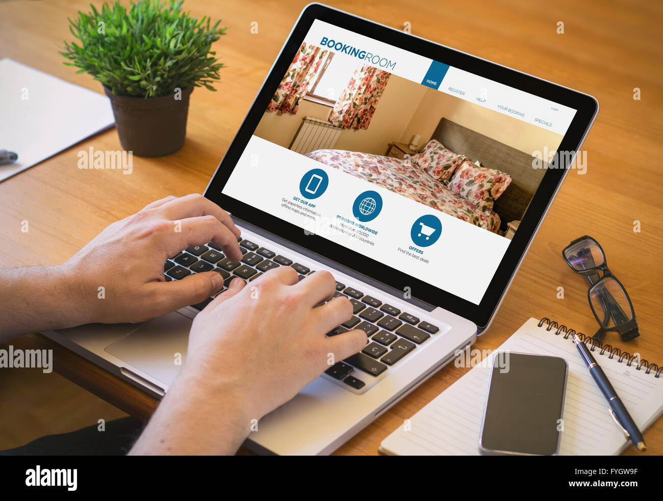 Businessman at work booking a room. Close-up top view of man booking a ...