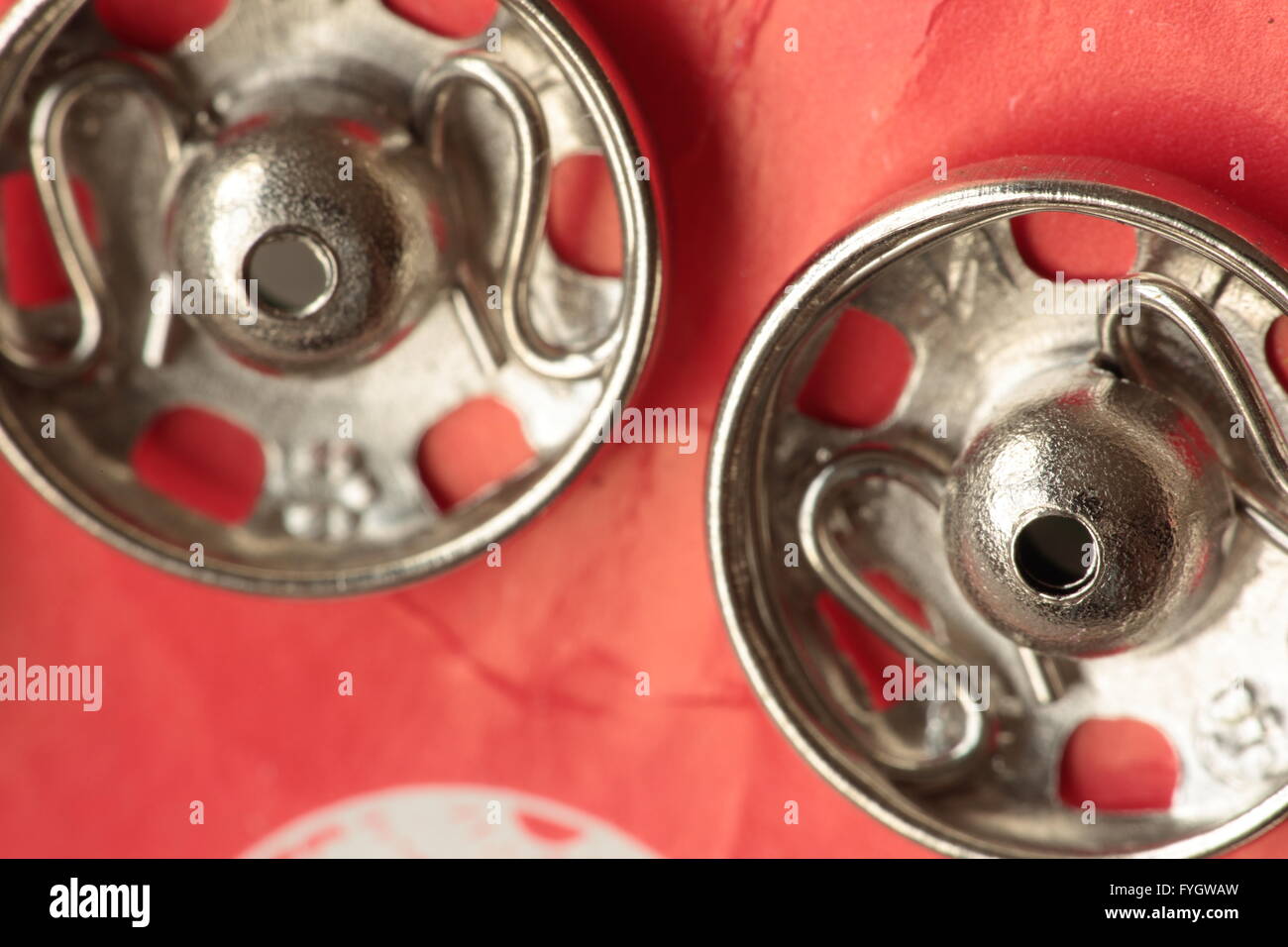 metal buttons photographed close Stock Photo - Alamy