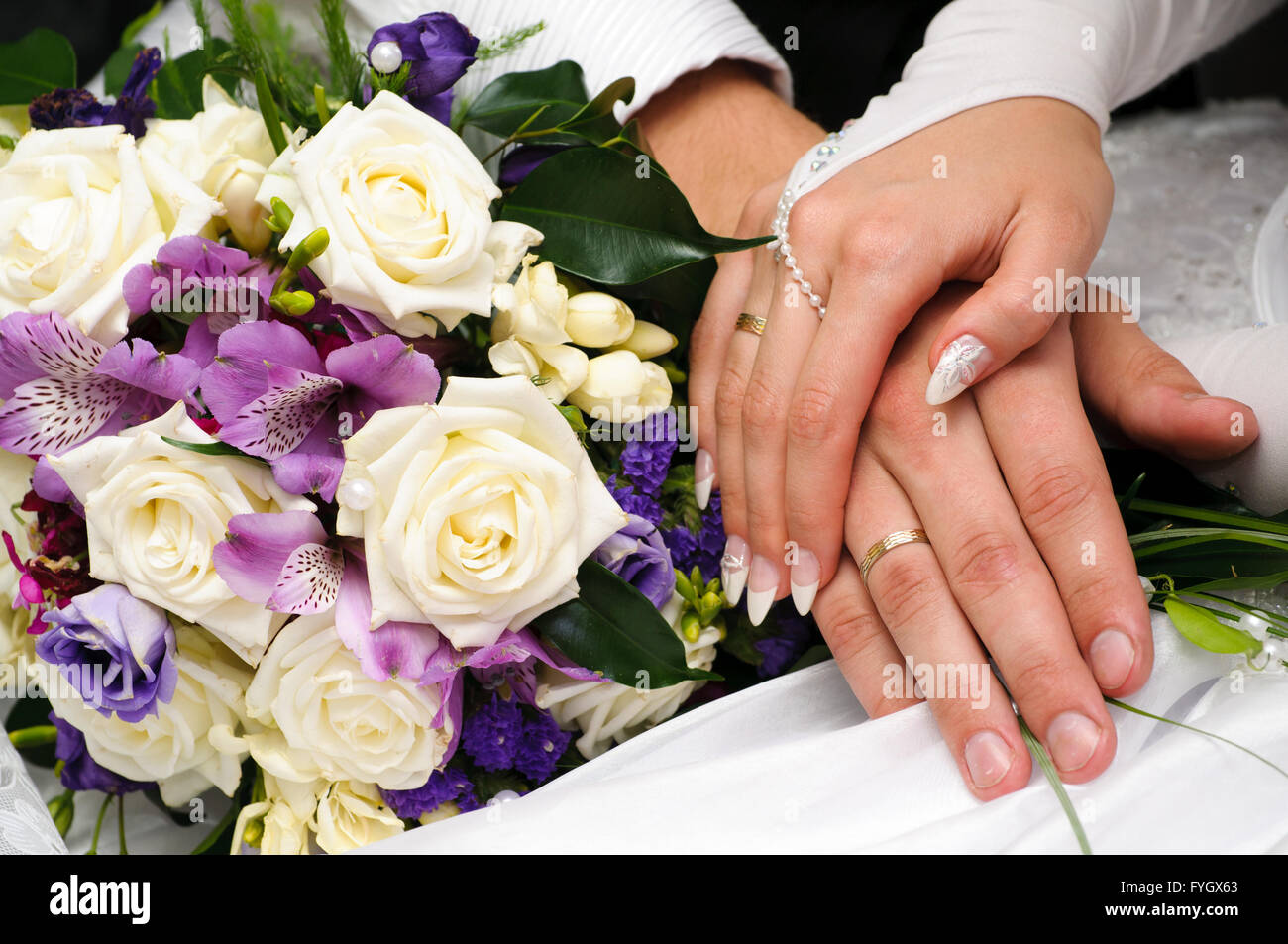 love touch. wedding hands with flowers Stock Photo - Alamy