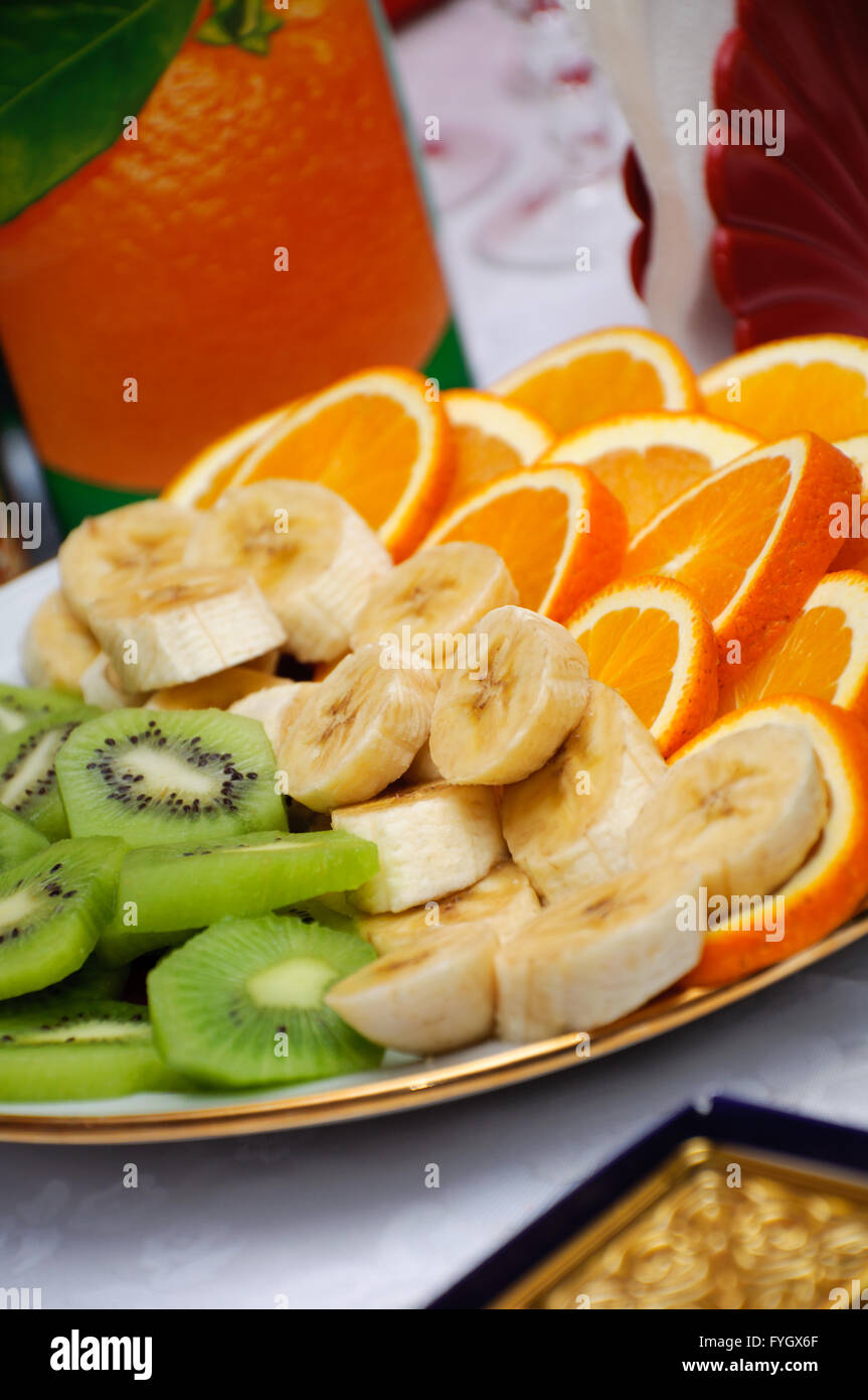 Plate with delicious fruit Stock Photo - Alamy