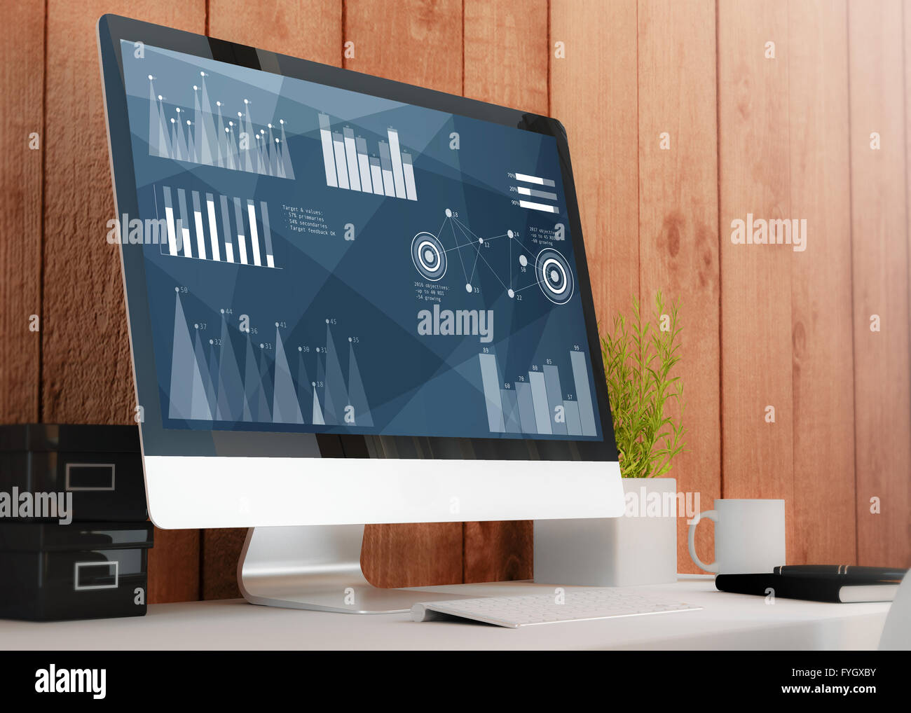 modern wooden workspace with computer showing stock graphics. All ...