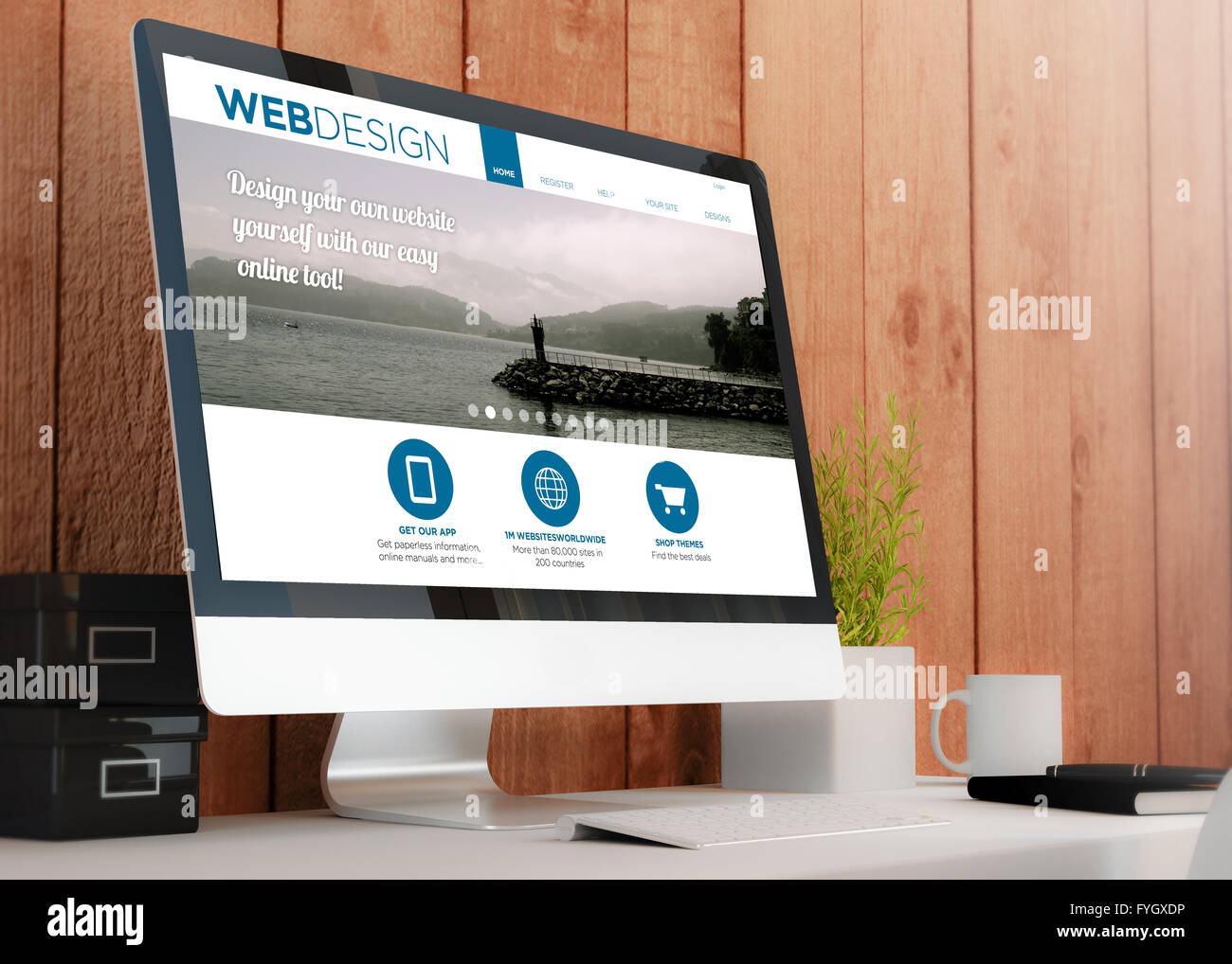 modern wooden workspace with computer showing web design website. All ...