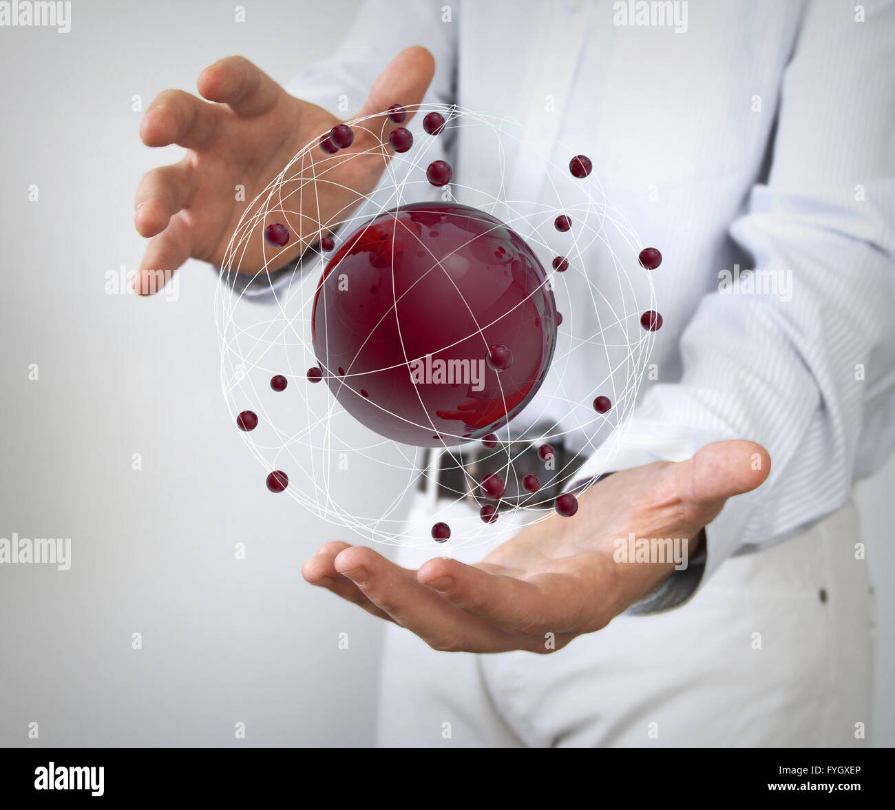 molecule concept: 3d atom between hands Stock Photo - Alamy