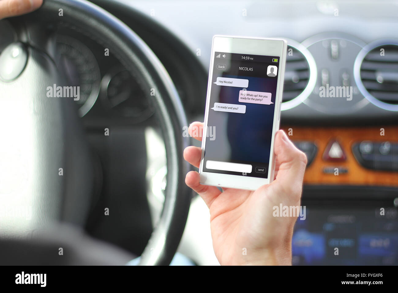 driving risks concept: driver holding smartphone with chat app ...